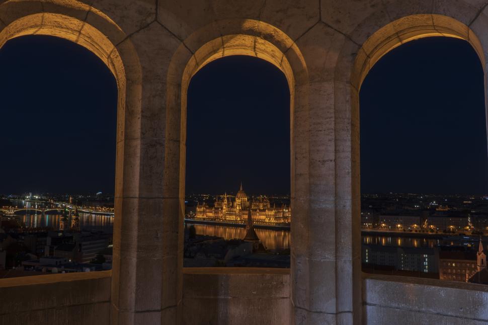 Free Stock Photo of A Glimpse of a City at Night Through a Window ...