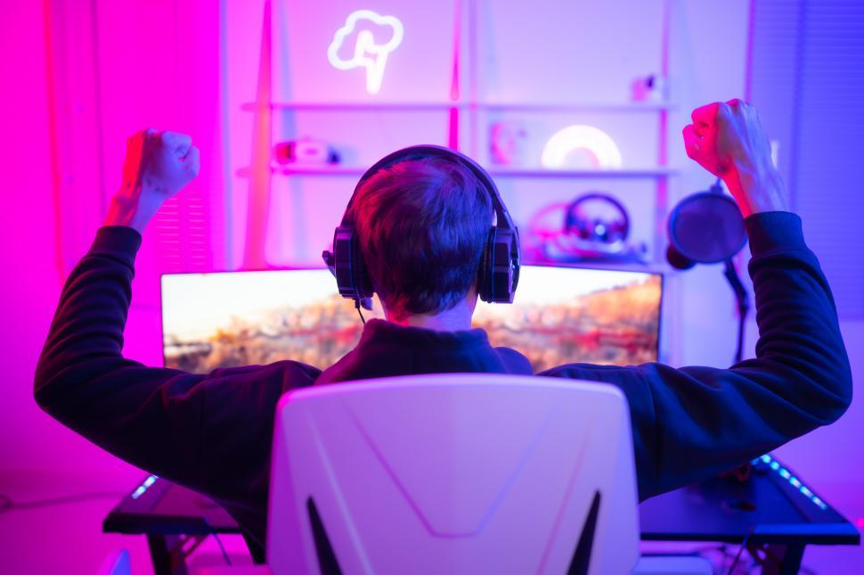 Free Stock Photo of Gamer holding his hands in the air after victory ...