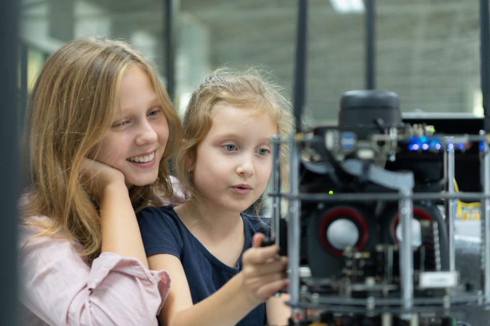 Free Stock Photo of Two girls working with a machine in a STEM robotics ...