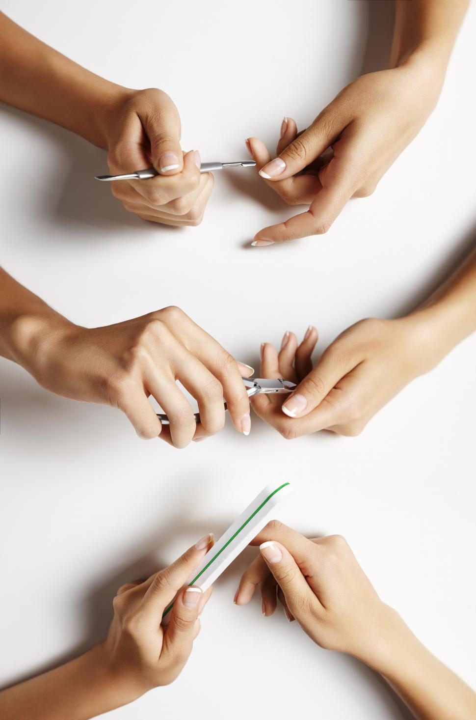 Free Stock Photo of Female hands showing process of a manicure, white ...