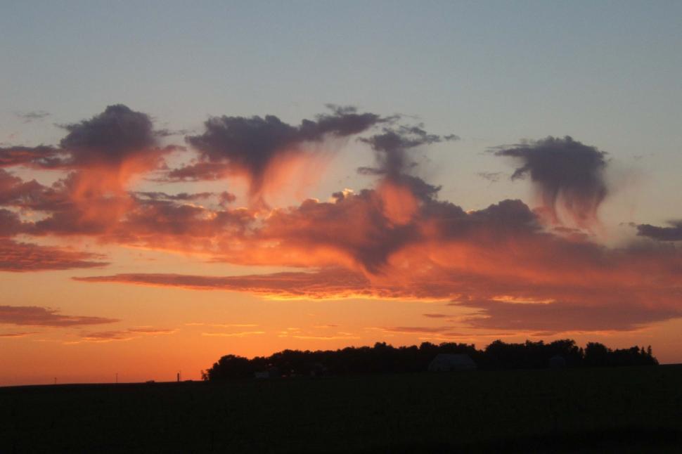 Free Stock Photo of The Sun Setting Over a Field With Trees | Download ...