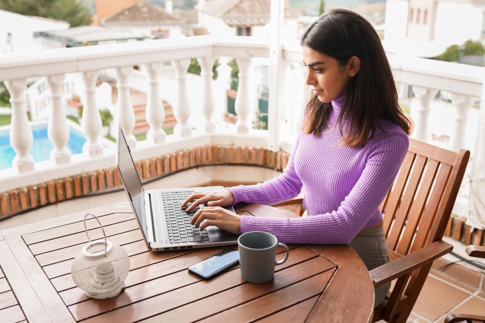 Free Stock Photo of Persian woman on her balcony using laptop computer ...