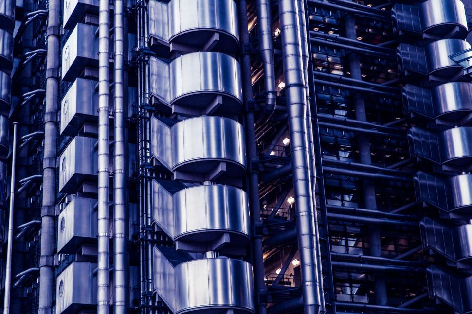 Free Stock Photo of A metal building with multiple metal pipes ...