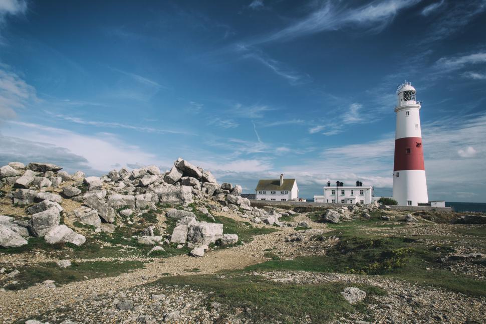 Free Stock Photo of A lighthouse with rocks and a building | Download ...