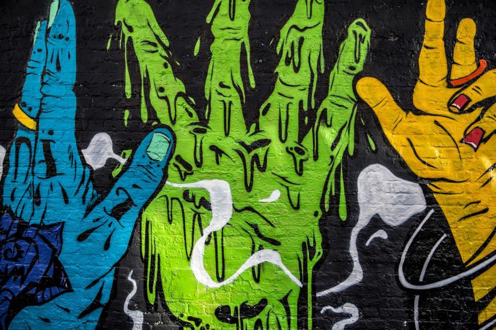 Free Stock Photo of A graffiti of a hand among other hands | Download ...