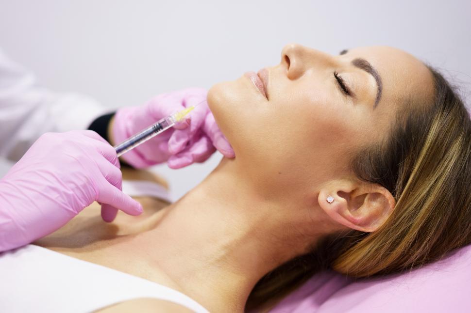 Free Stock Photo of Doctor injecting hyaluronic acid into the ching of ...