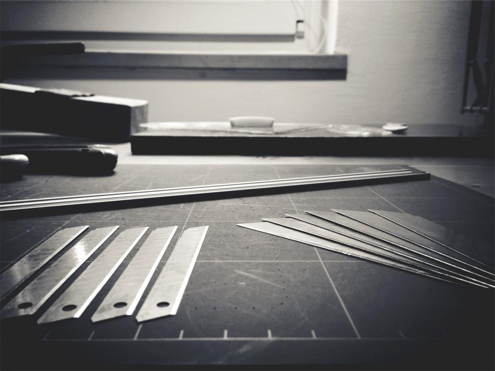 Free Stock Photo of A group of metal pieces on a table | Download Free ...