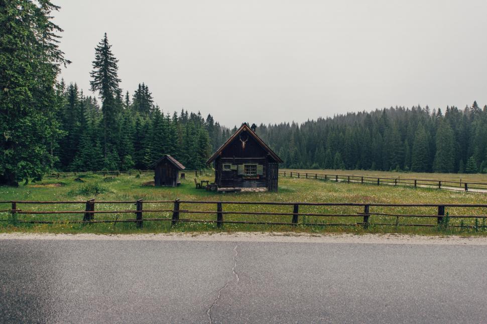 Free Stock Photo of A house in a field with trees in the background ...