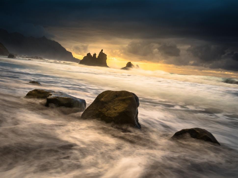 Free Stock Photo of A waves crashing onto rocks on a beach | Download ...