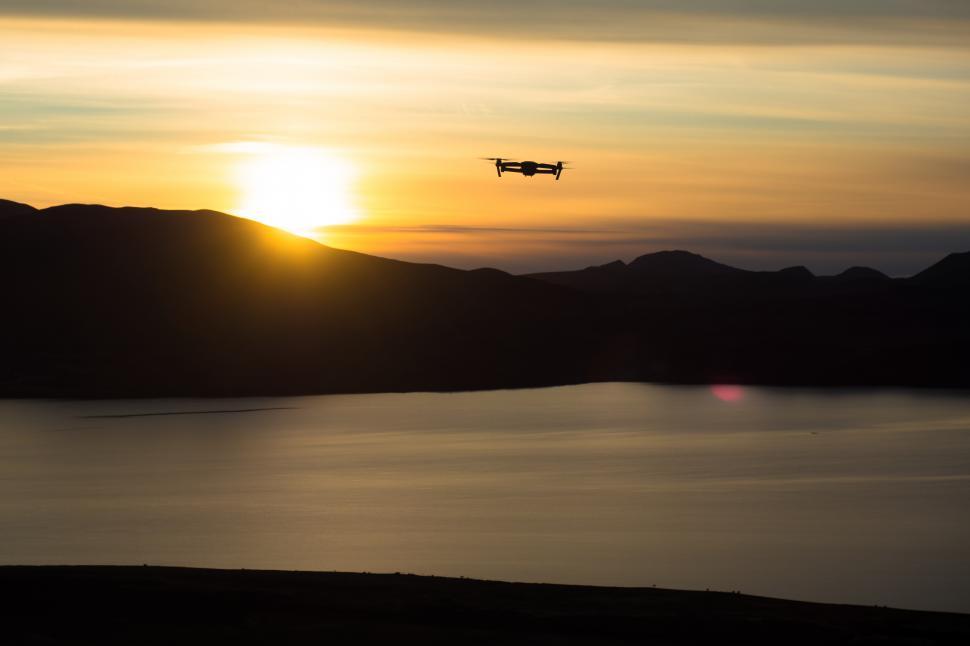 Free Stock Photo of A drone flying over water | Download Free Images ...