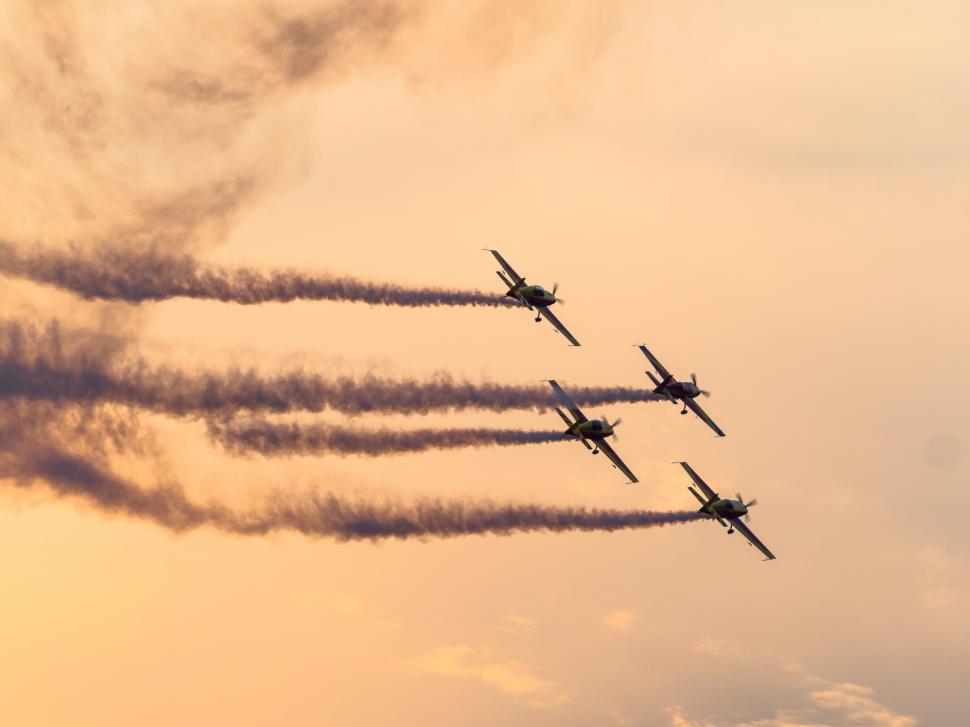 Free Stock Photo of A group of airplanes flying in formation with smoke ...