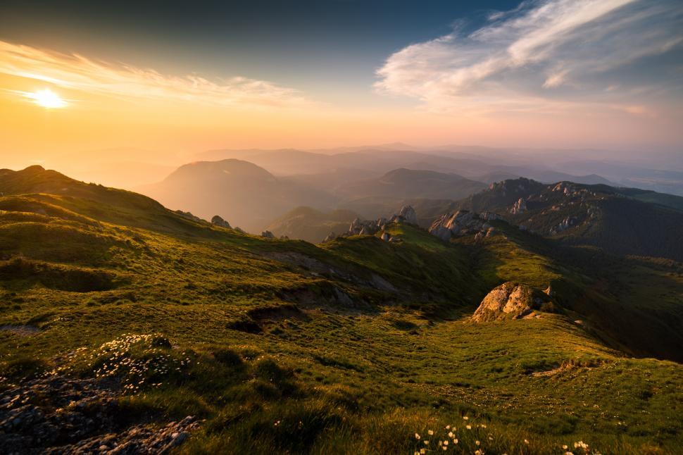Free Stock Photo of A green hills with mountains in the background ...