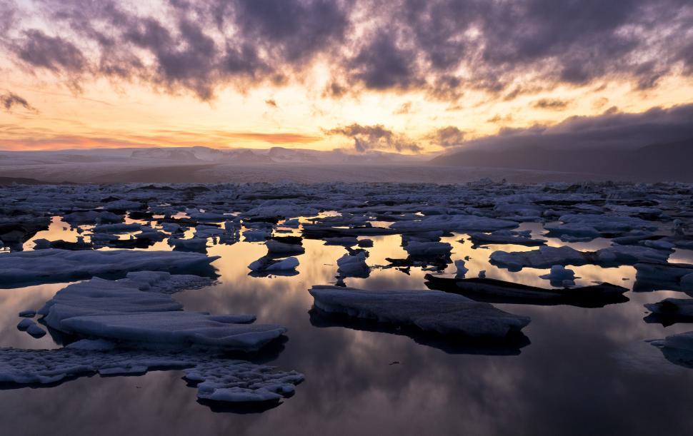 Free Stock Photo of Ice floating ice in water with mountains in the ...