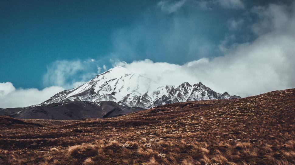 Free Stock Photo of Snow Covered Mountain Under Cloudy Sky | Download ...