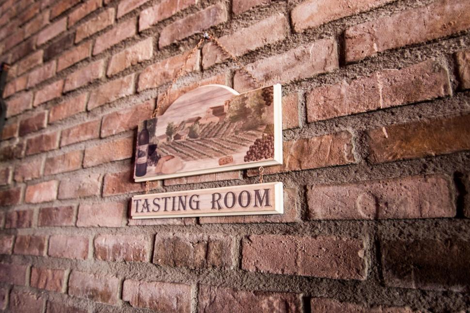 Free Stock Photo of A sign on a brick wall | Download Free Images and ...