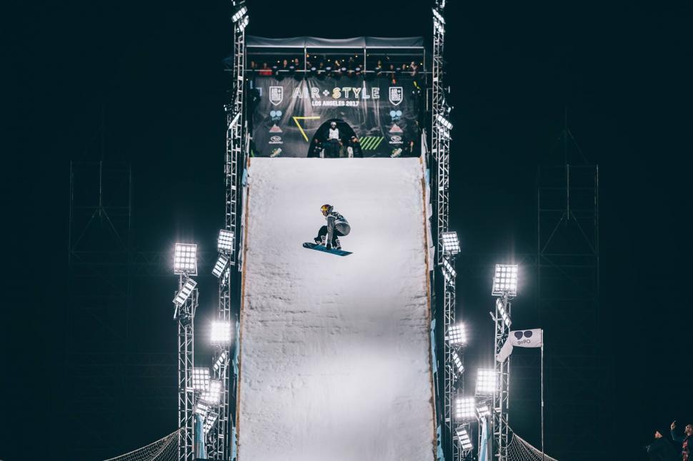 Free Stock Photo of A person on a snowboard going down a ramp ...