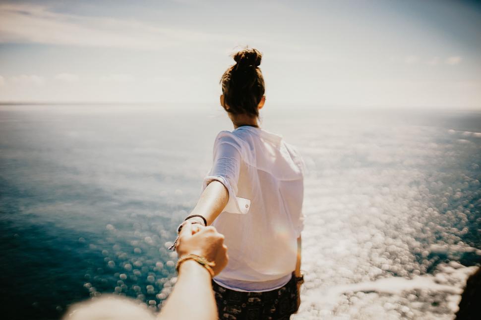 Free Stock Photo of Woman leading partner towards the ocean | Download ...