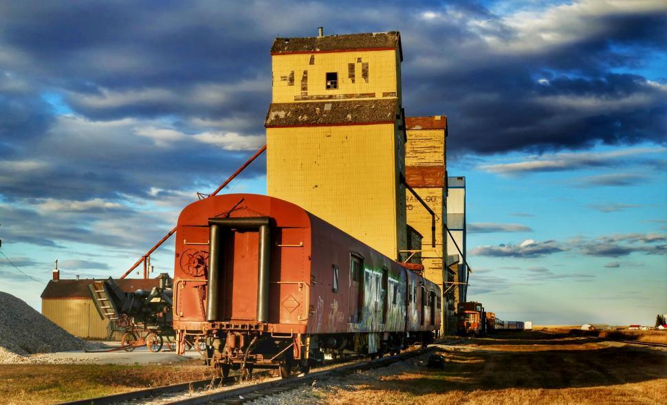Free Stock Photo of Vintage train by historical grain elevator ...