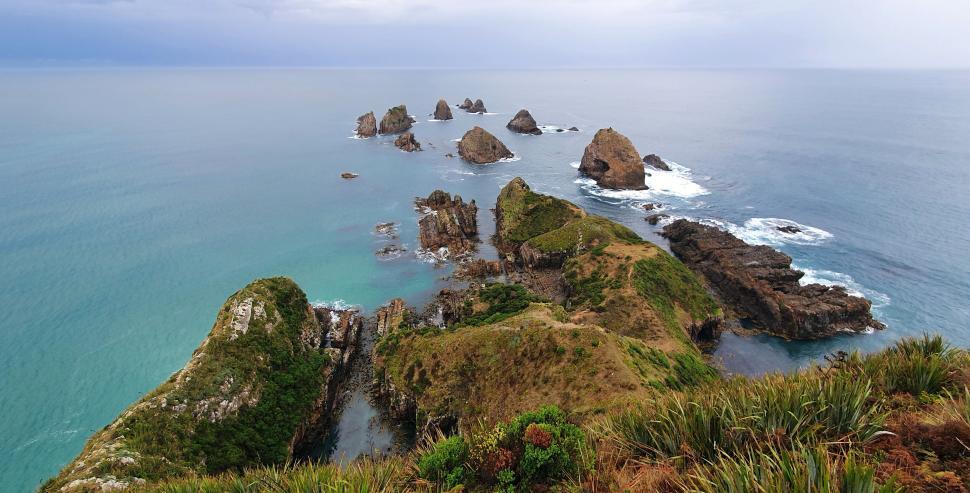 Free Stock Photo of Cliffside view with jagged rocks and ocean ...