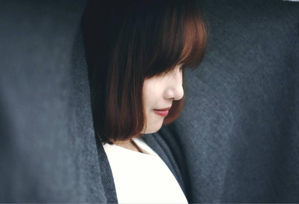 Free Stock Photo of Young woman partially hidden by shadow | Download ...