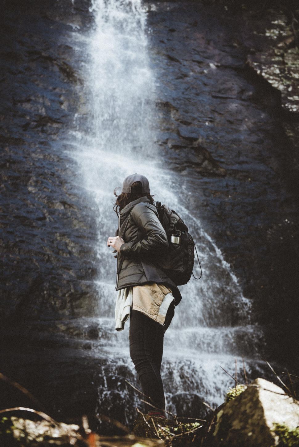 Free Stock Photo of Explorer in front of majestic waterfall | Download ...