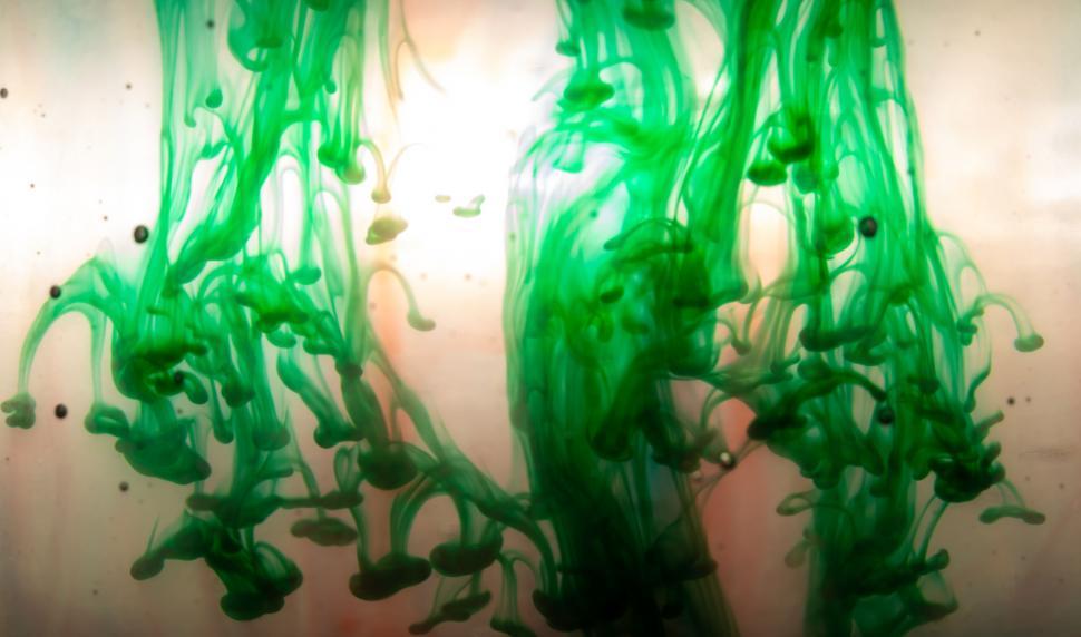 Free Stock Photo of Green ink swirling in water on soft background ...