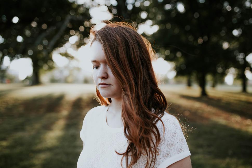Free Stock Photo of Woman with sunlight in her hair in a park ...