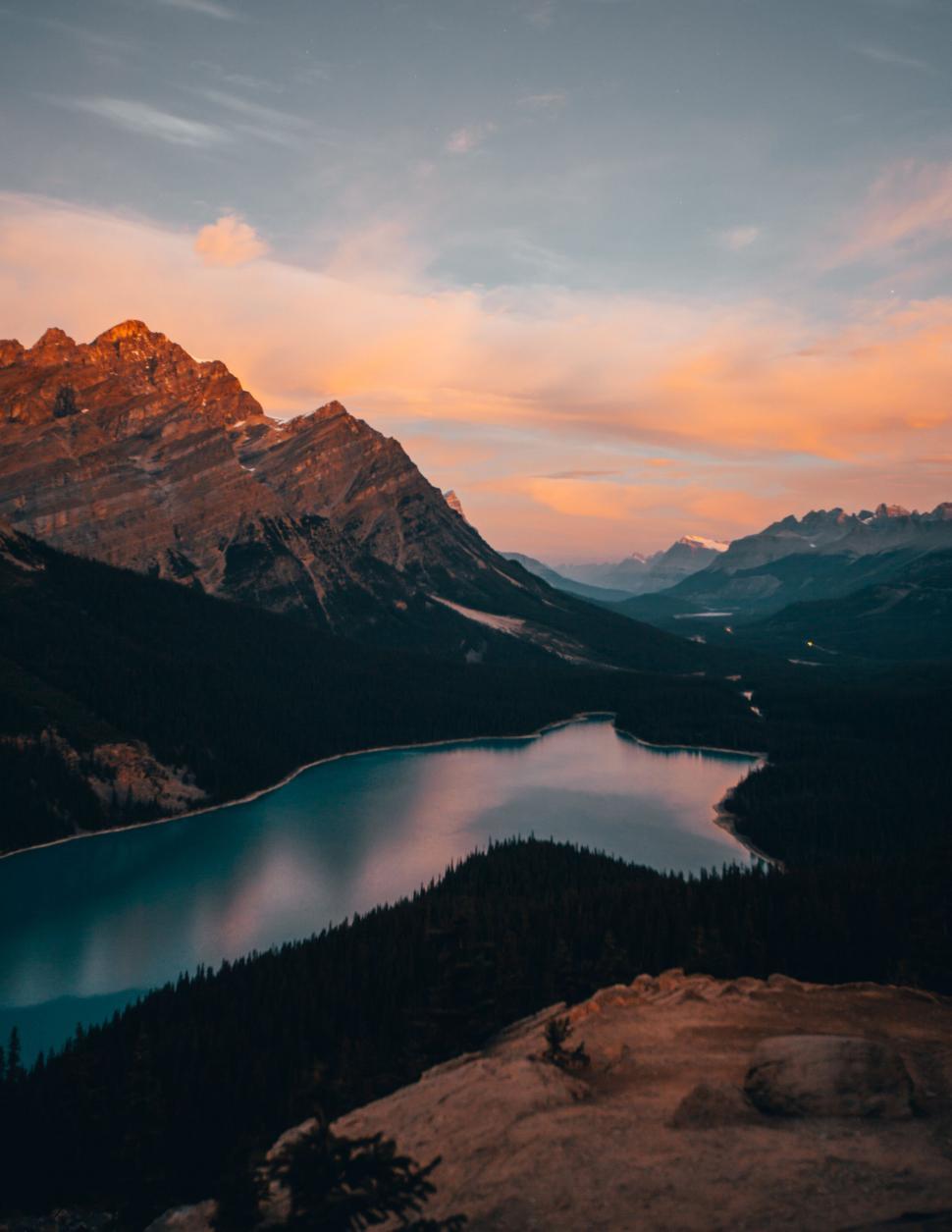 Free Stock Photo of Sunset illuminating a mountainous lake scenery ...