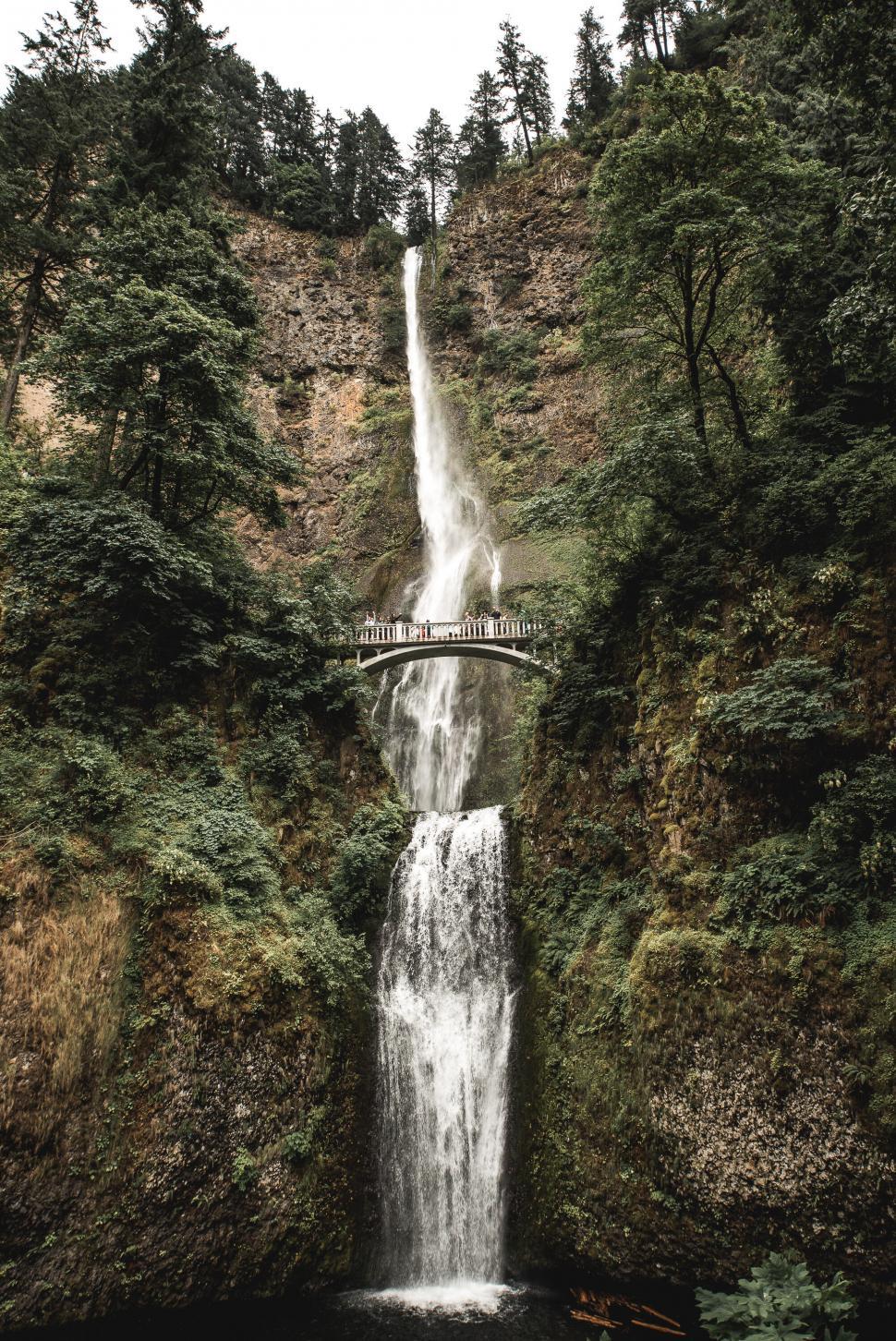 Free Stock Photo of Majestic multi-tiered waterfall with a bridge ...