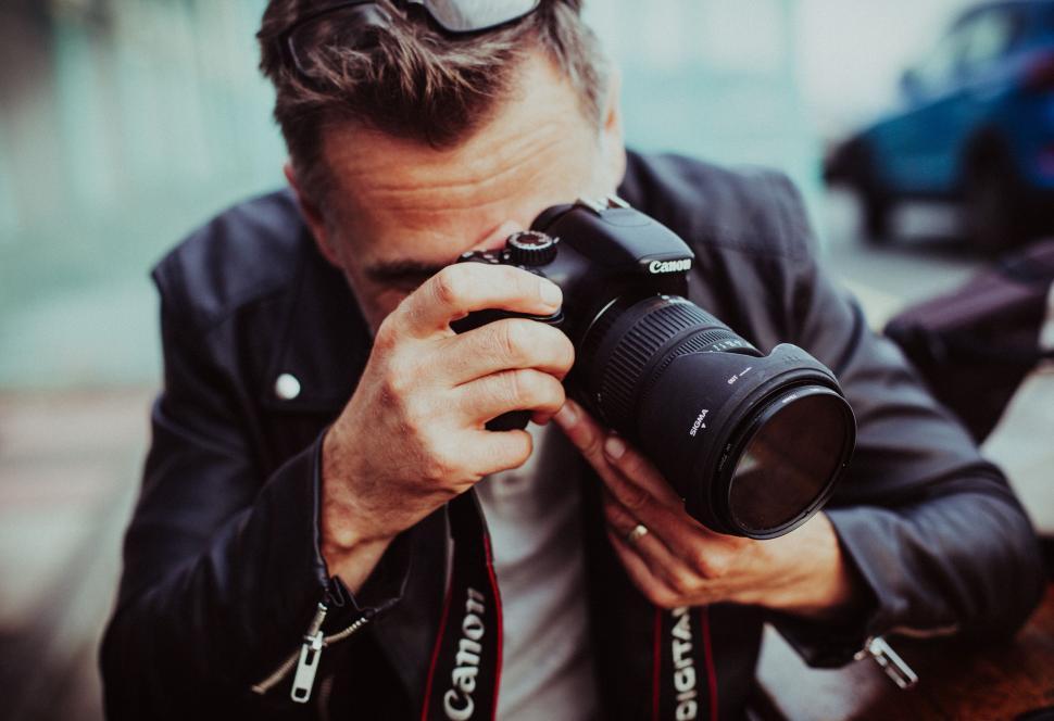 Free Stock Photo of Photographer with camera obscured by blurred ...