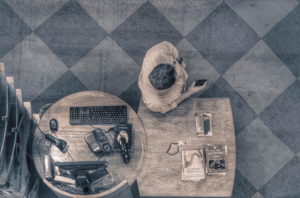 Free Stock Photo of Top-down view of a person using smartphone ...