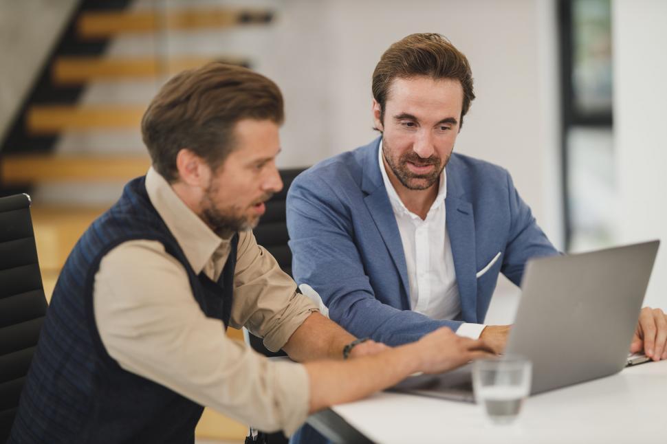 Free Stock Photo of Two businessmen engaged in a discussion | Download ...