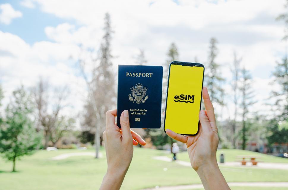 Free Stock Photo of A photo displaying a U.S. passport and a smartphone ...