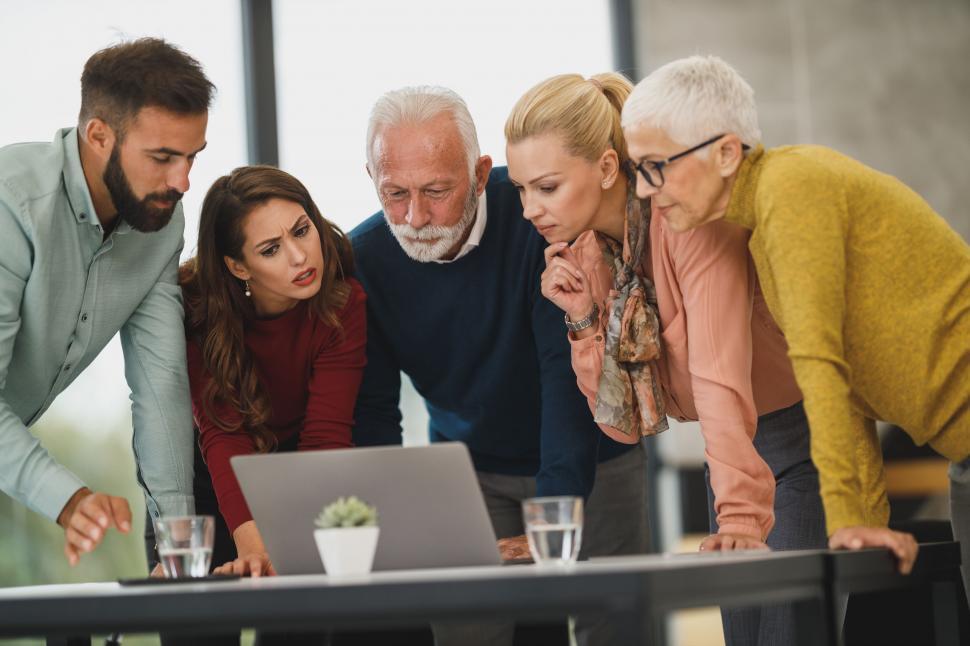 Free Stock Photo of Team analyzing data on a laptop | Download Free ...