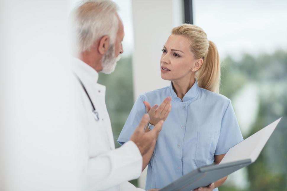 Free Stock Photo of Nurse discussing with senior doctor | Download Free ...