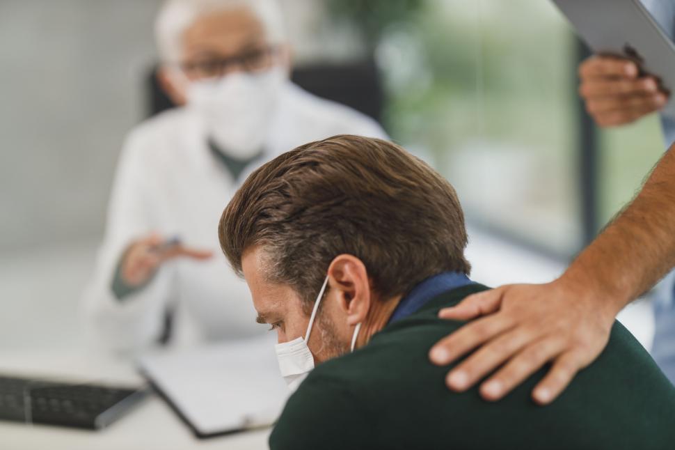 Free Stock Photo of Colleague consoling a stressed worker | Download ...
