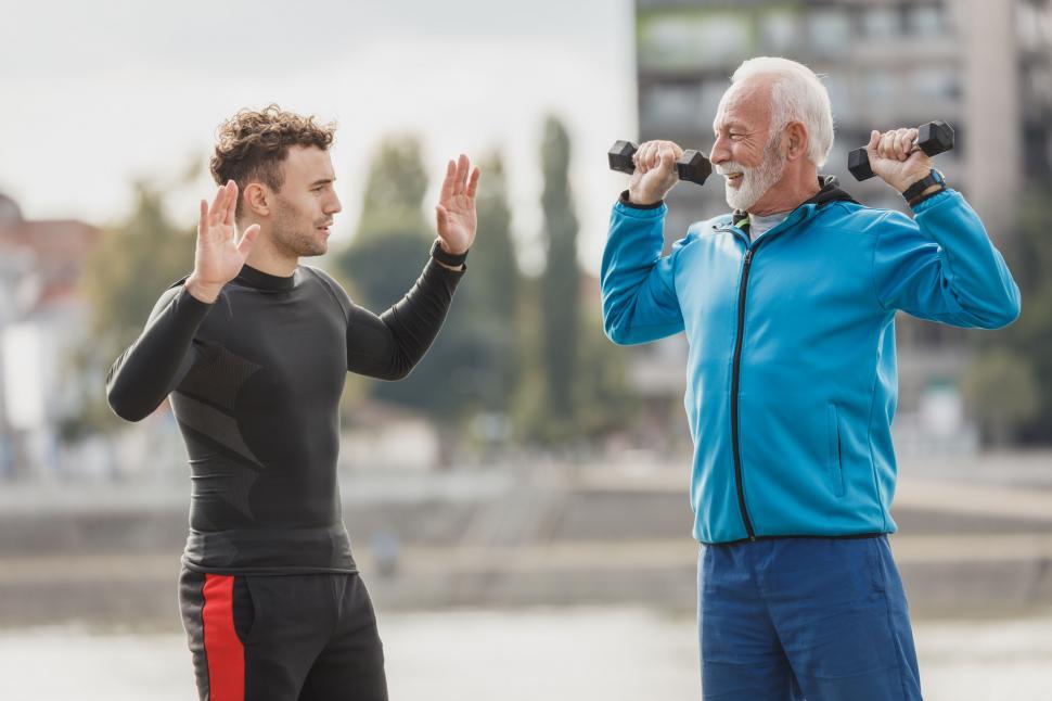Free Stock Photo of Two men stretching before exercise outdoors ...