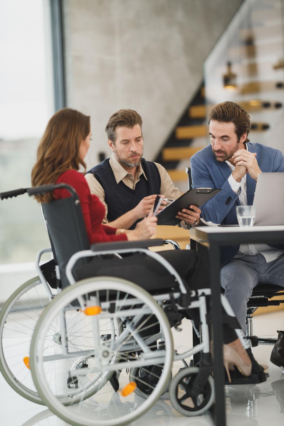 Free Stock Photo of Business meeting with a disabled professional ...