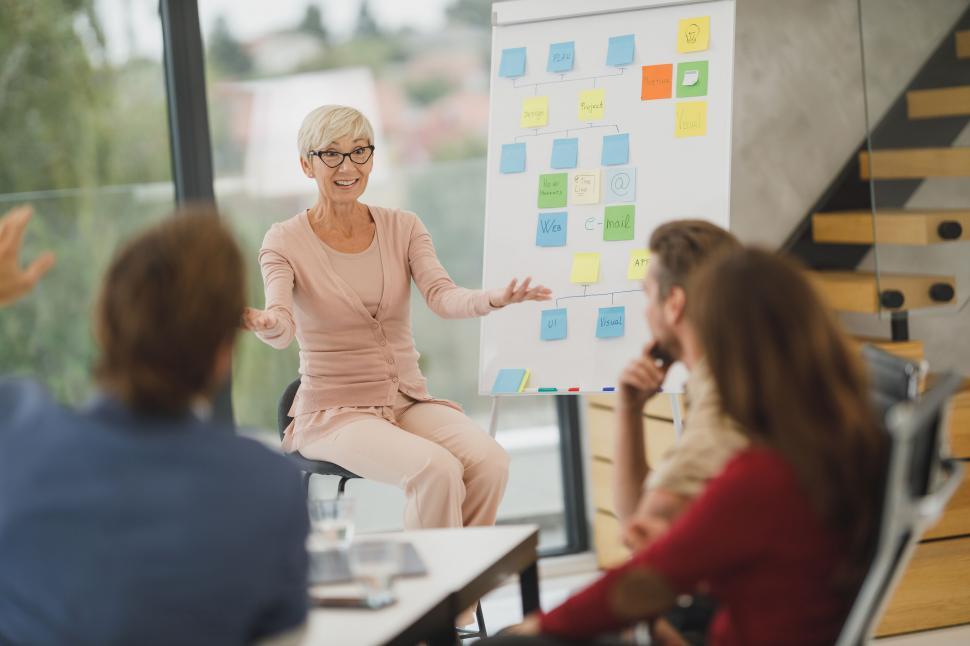 Free Stock Photo of Creative workshop facilitator in an office setting ...
