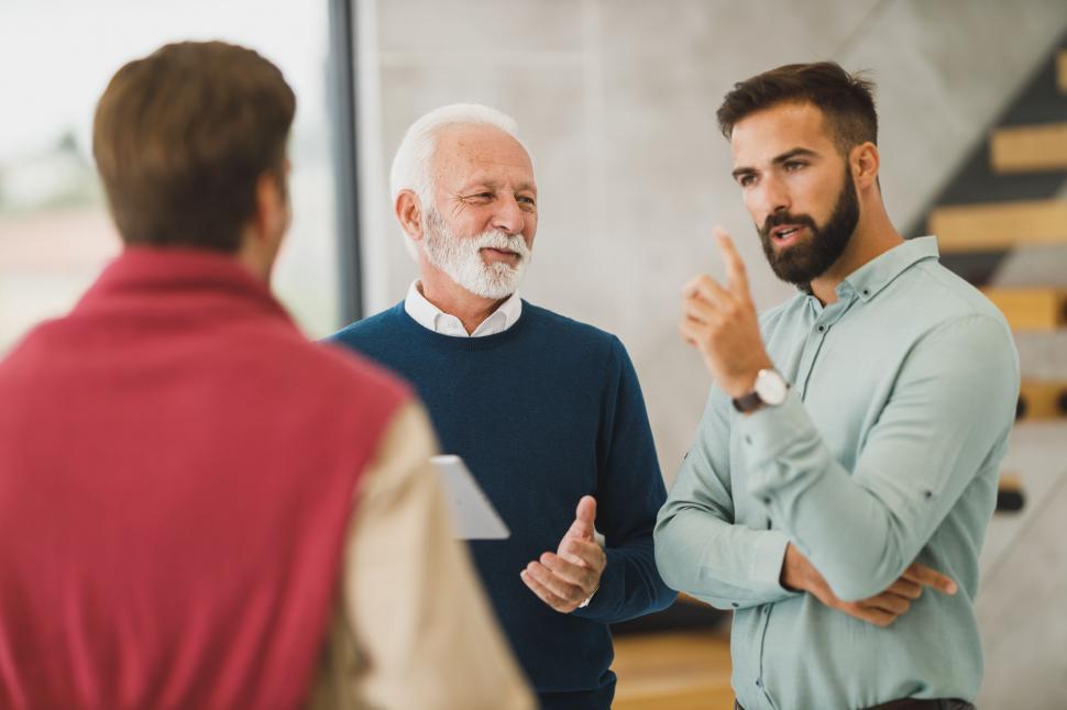 Free Stock Photo of Colleagues having a thoughtful discussion ...