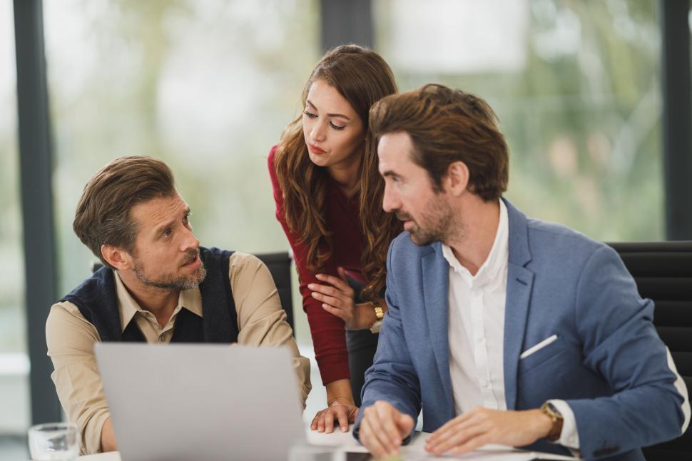 Free Stock Photo of Team discussing project with focus and teamwork ...