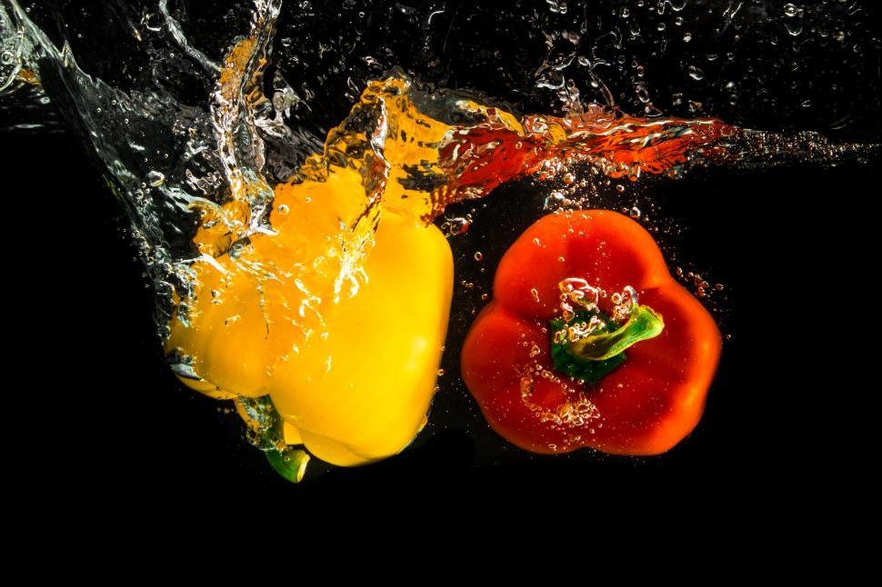 Free Stock Photo of Bell pepper splash in water on black | Download ...