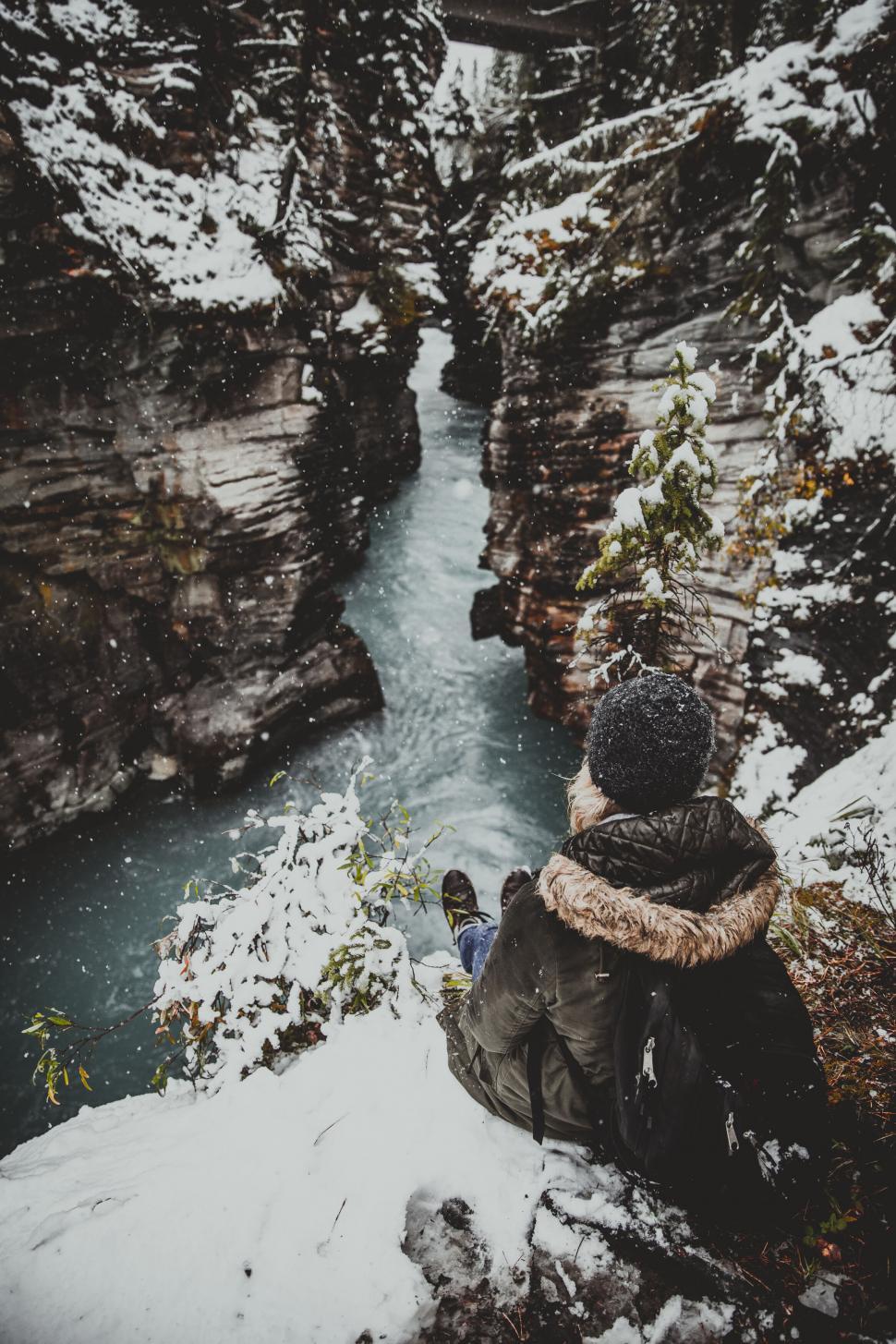 Free Stock Photo of Person overlooking a snowy canyon river | Download ...