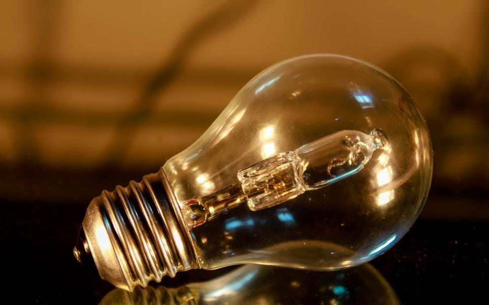 Free Stock Photo of Incandescent light bulb on reflective surface ...