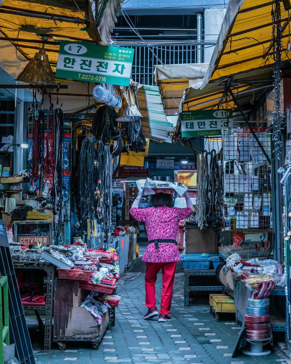 Free Stock Photo of Market alley with traditional goods and shopper ...
