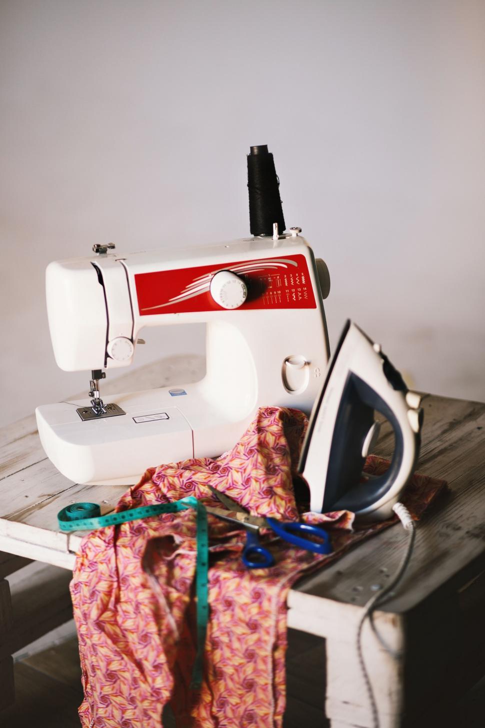 Free Stock Photo of Sewing machine setup with fabric and iron ...