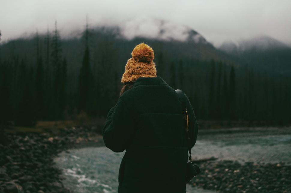 Free Stock Photo of Solitary Figure by River with Autumn Foliage ...