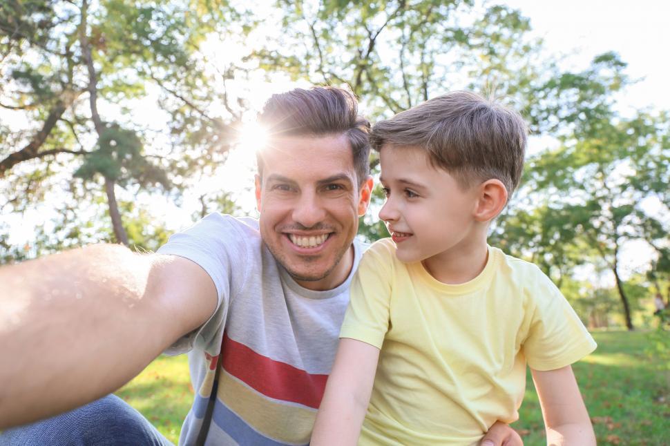 Free Stock Photo of Father and son taking selfie in park | Download ...