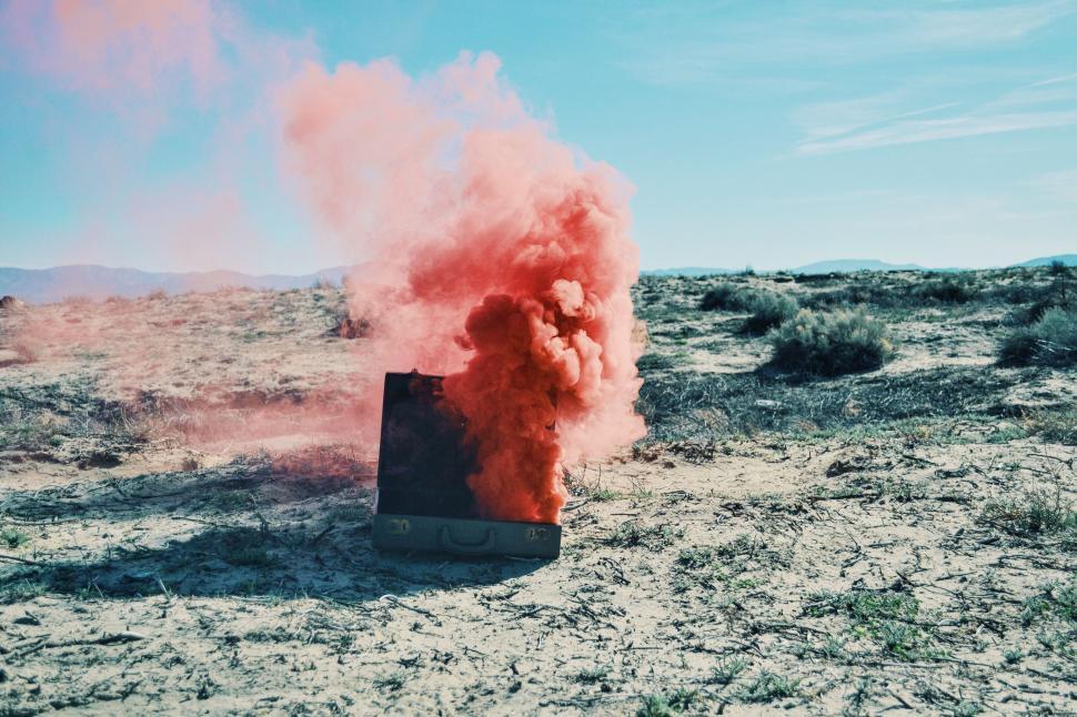 Free Stock Photo of Red smoke bomb in barren landscape | Download Free ...