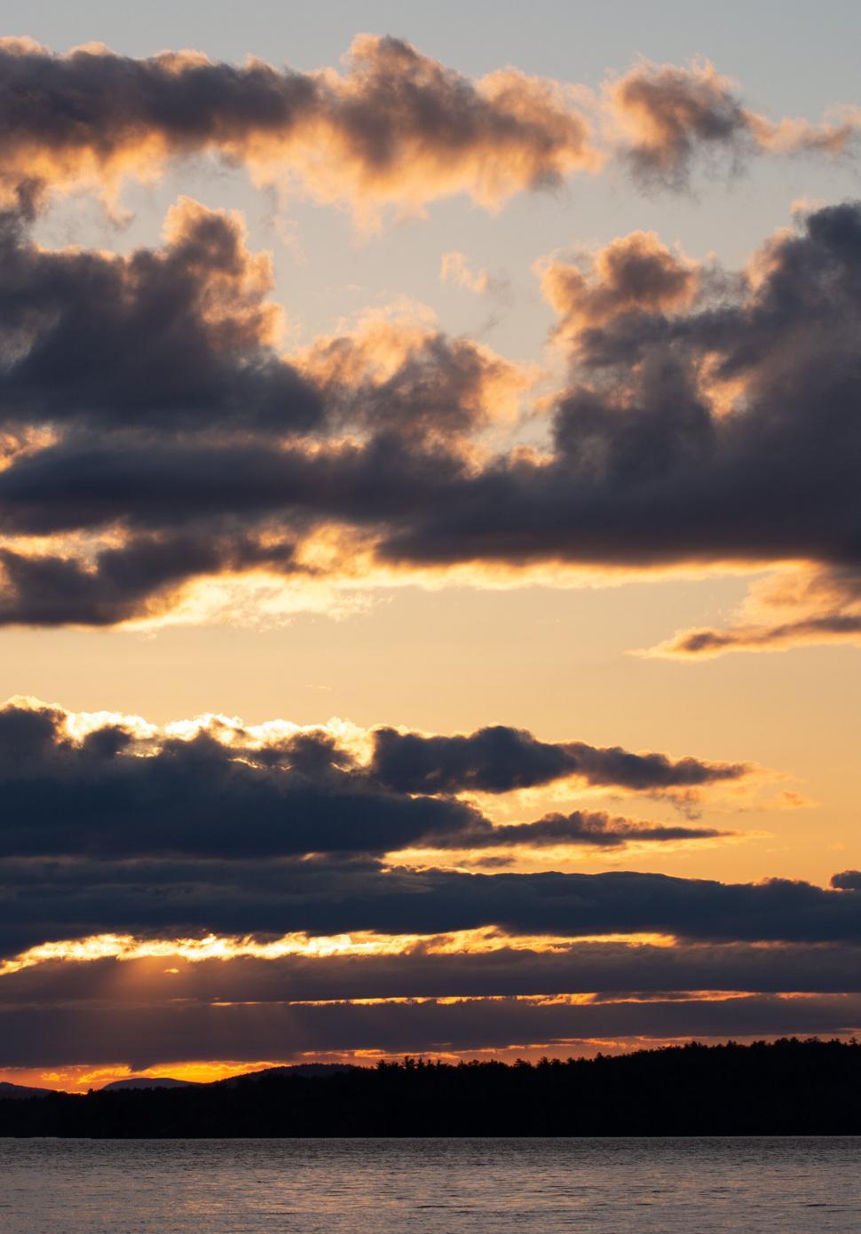 Free Stock Photo of Sunset cloudscape over a calm lake | Download Free ...